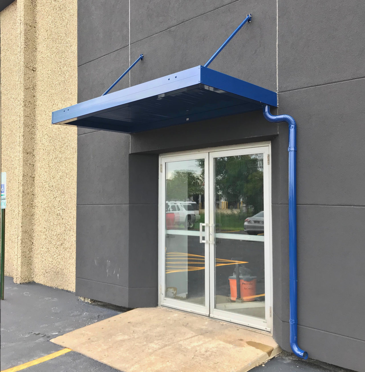 Looking to add a custom awning to your store front? | Signature Metal Works
