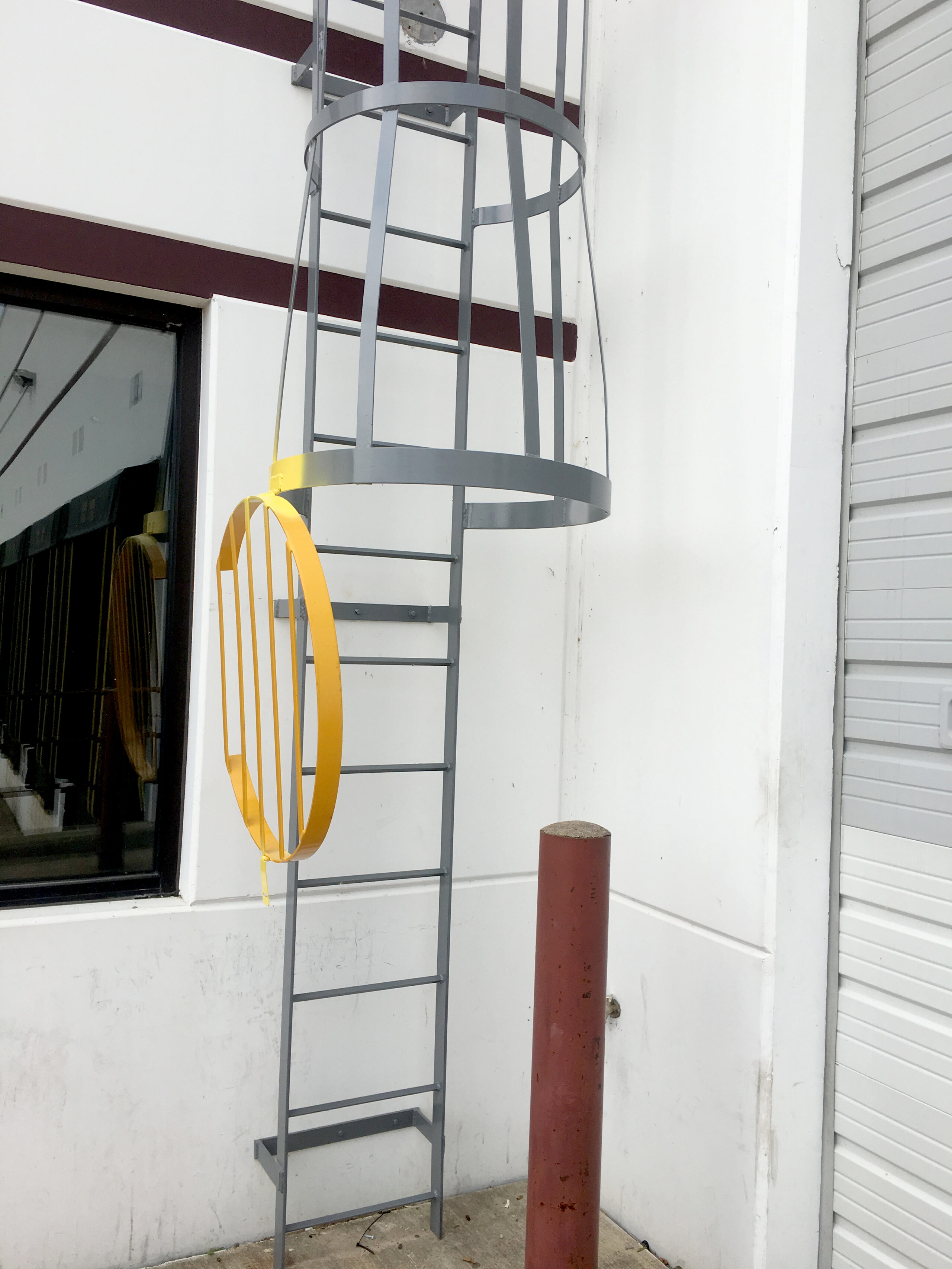 Looking to add a custom roof access ladder with safety cage to your ...