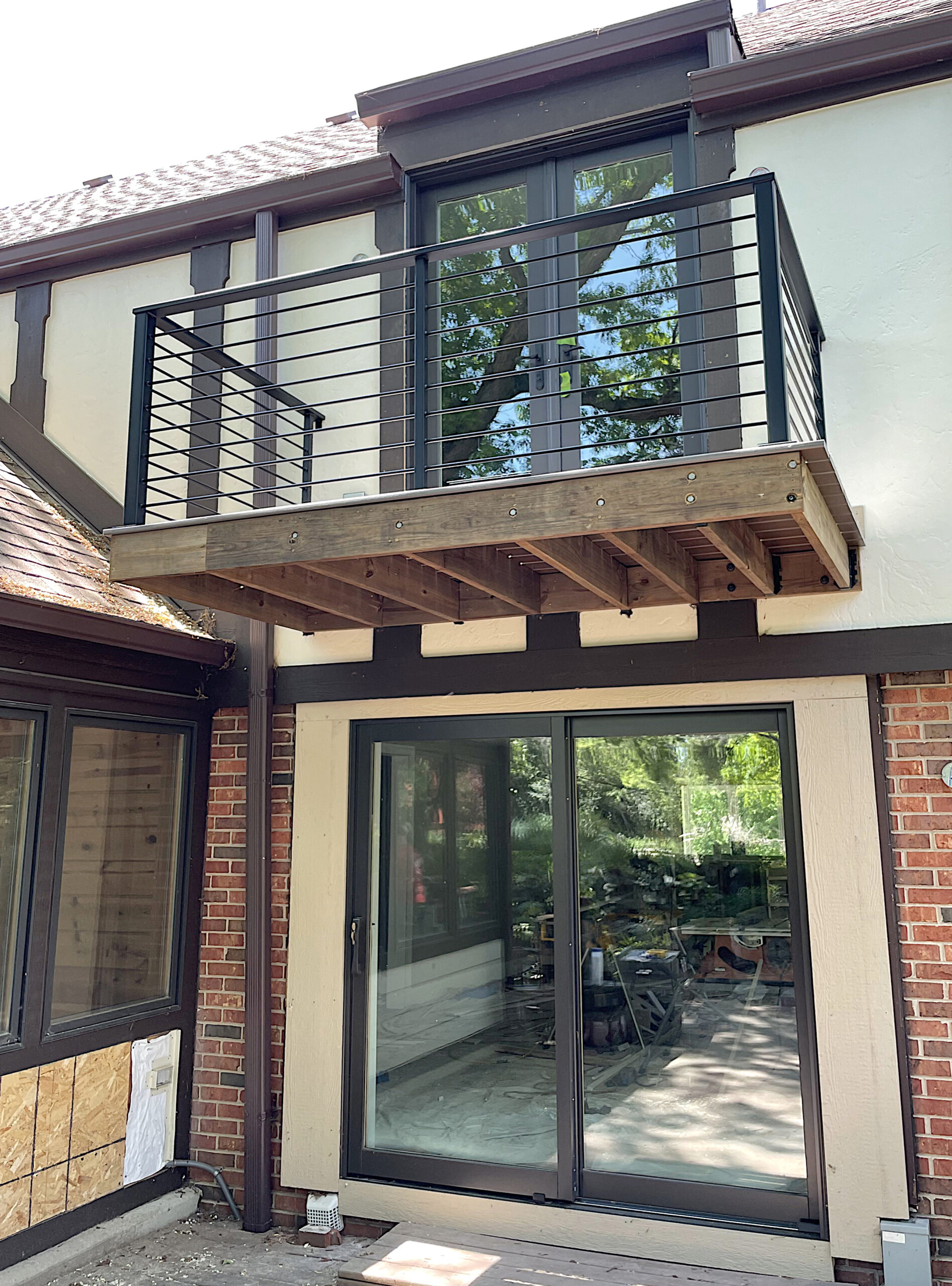 Traditional wrought iron balconies painted satin black in Oak Park ...