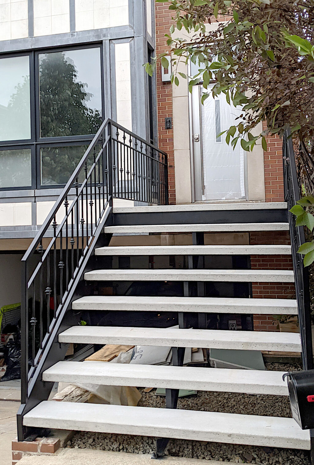 Modern Wrought Iron Concrete Stairs Painted Satin Black In Chicago