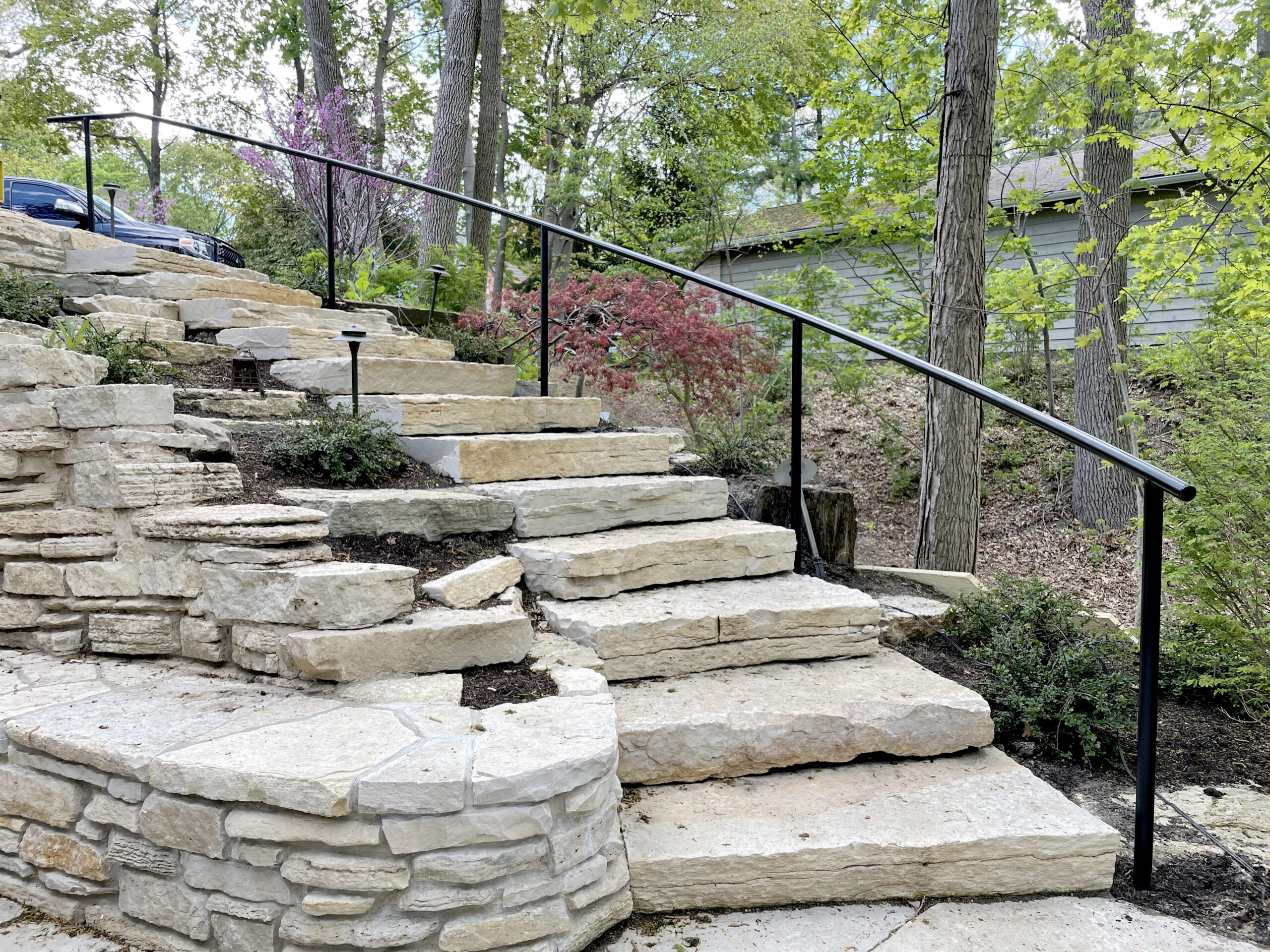 Traditional wrought iron handrails painted satin black in Lake Forest ...