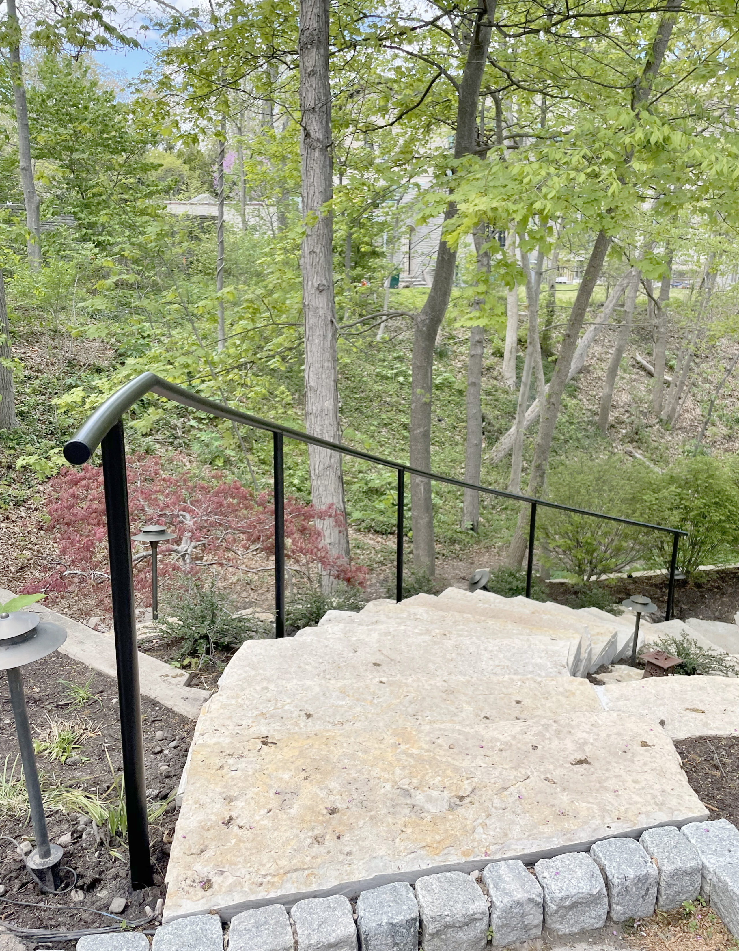 Traditional wrought iron handrails painted satin black in Lake Forest ...