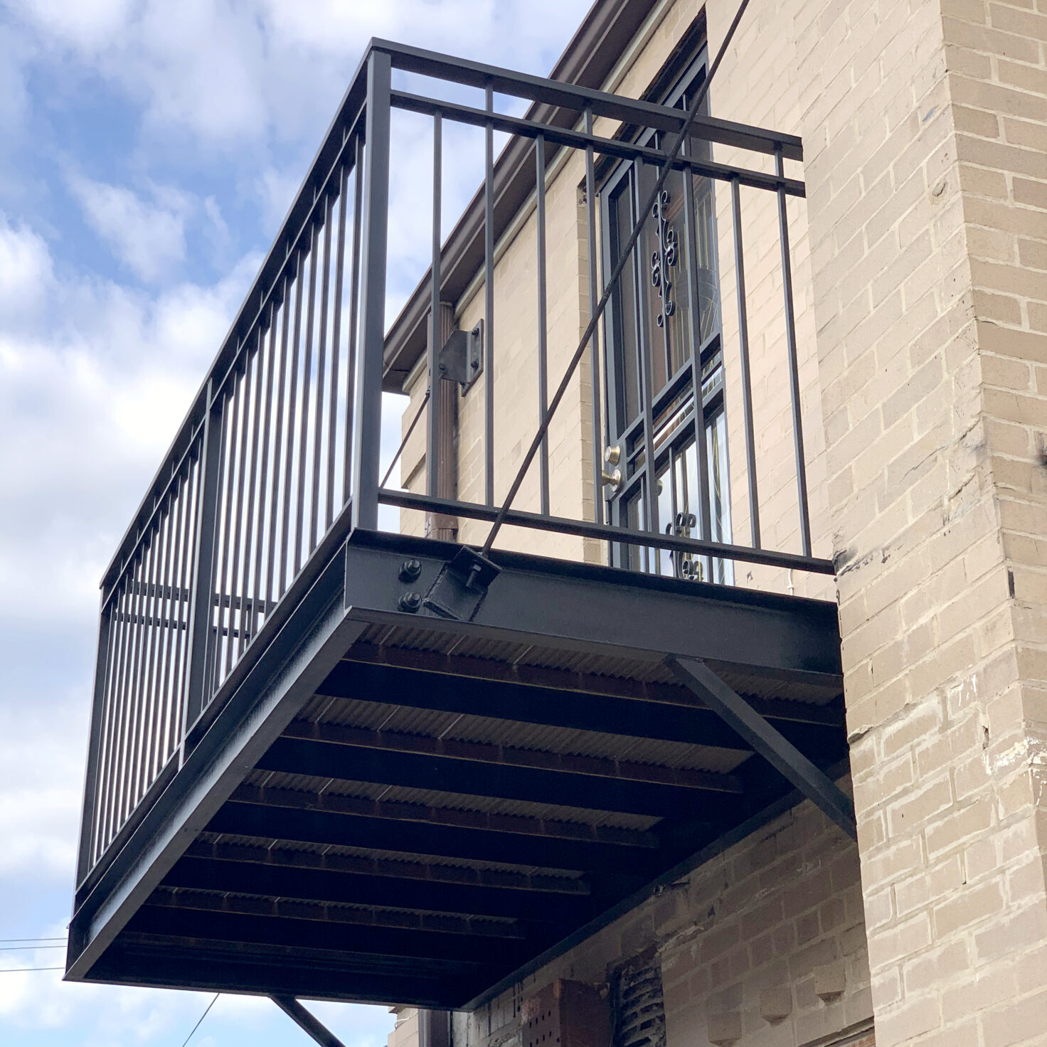 Custom wrought iron balconies for your home and business | Signature ...