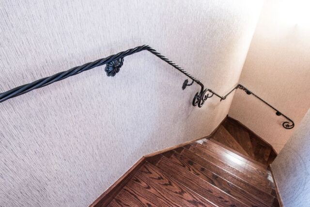 Looking for custom French Country scroll handrails? | Signature Metal Works