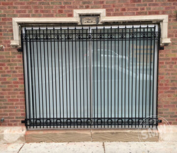 Custom wrought iron window guards for a home in Window Guards in ...
