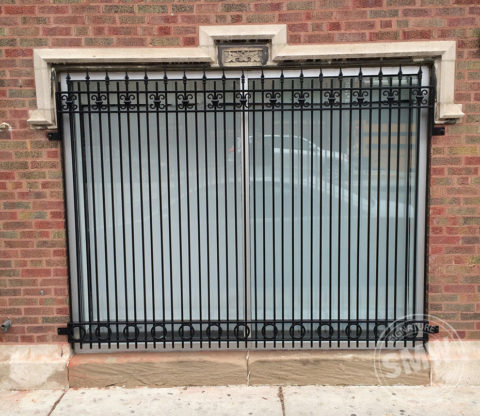 Custom wrought iron window guards for a home in Window Guards in ...